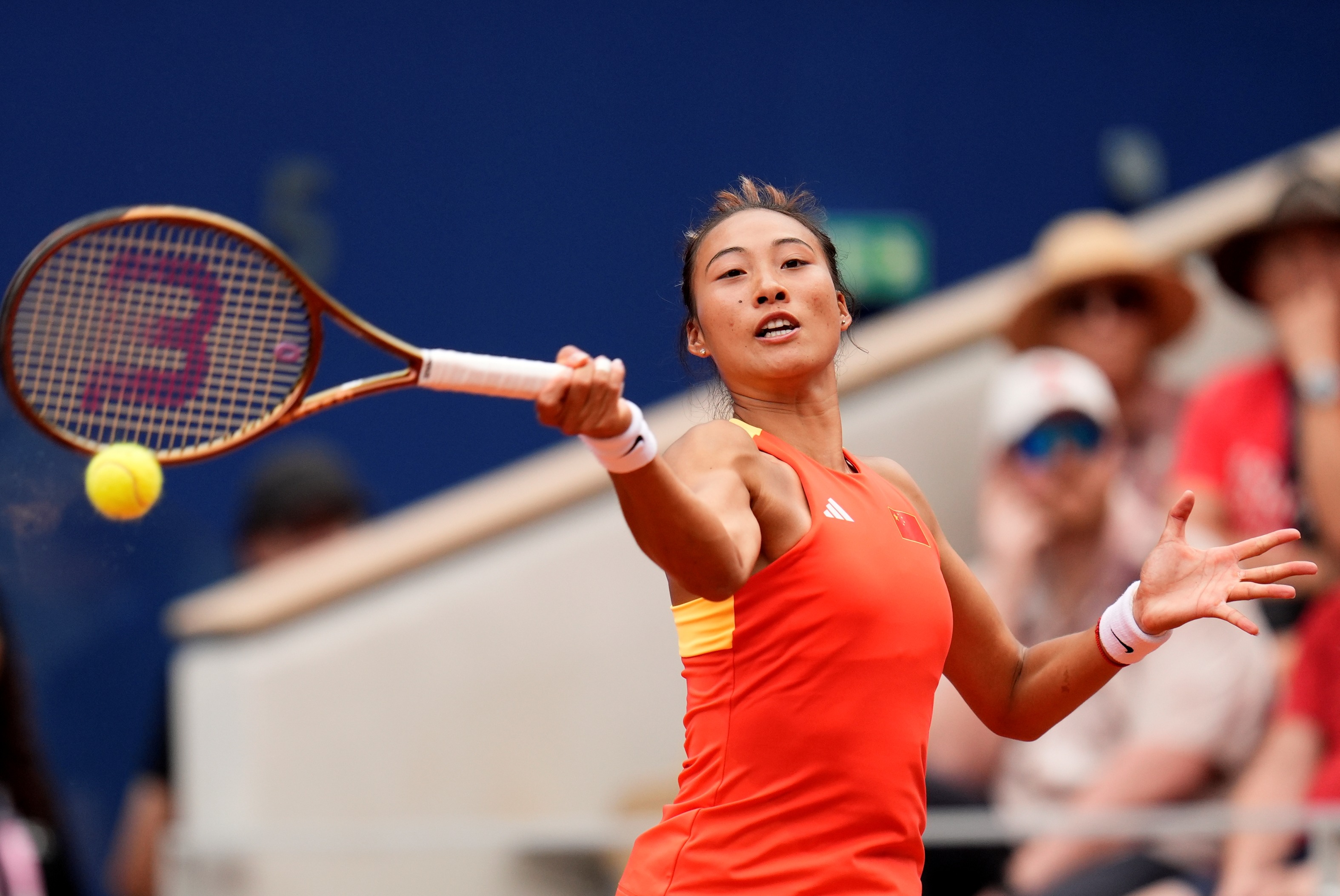 Chinese tennis star Zheng Qinwen: A "hardworking genius" | Athletes ...