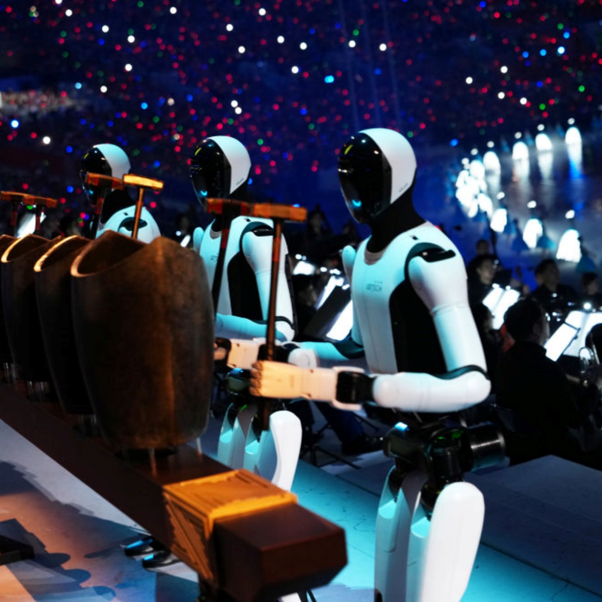 Chinese humanoid robots' new skills: Backflips, cycling and doing ...