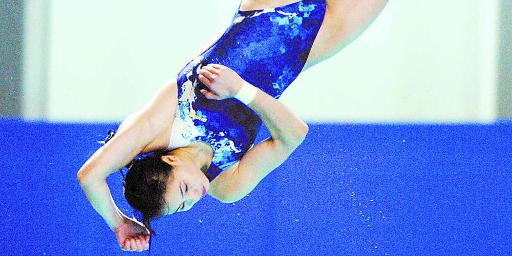 Chinese "Diving Queen" Fu Mingxia became youngest diving world champion ...